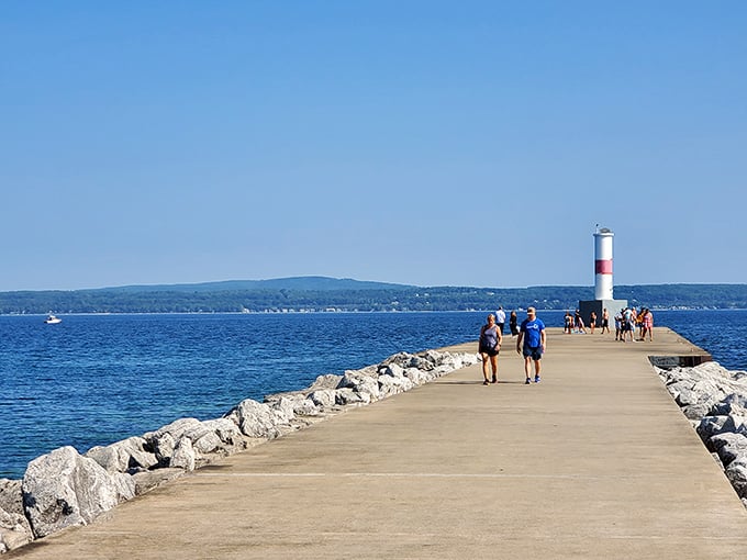 The breakwater pier stretches into Lake Michigan like nature's runway, offering panoramic views that no filter could improve.