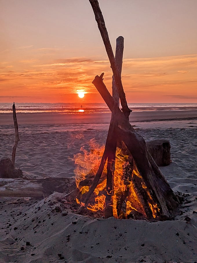 Primal entertainment at its finest – driftwood flames dance against an Oregon sunset, nature's television since time immemorial.