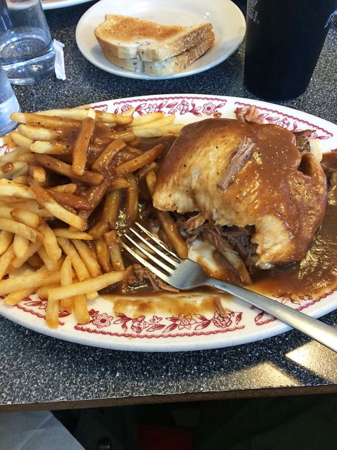 This hot turkey sandwich isn't trying to impress anyone with its looks, but that gravy—oh that gravy—could make a vegetarian question their life choices.