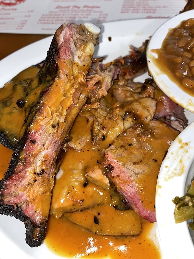 This isn't just barbecue—it's edible art. The smoke ring on that beef is like nature's stamp of approval.