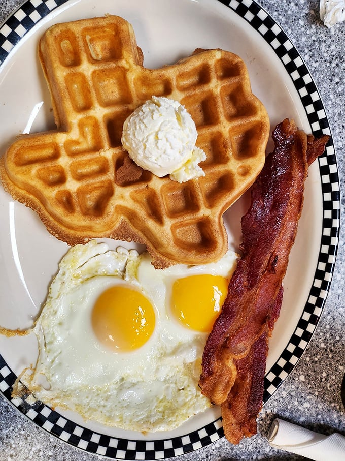 Texas pride never tasted so good. This waffle doesn't just look like the Lone Star State—it tastes like morning victory with a side of bacon.