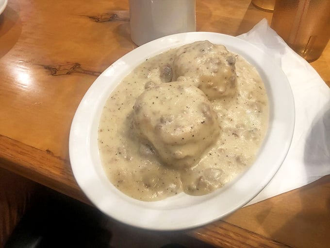 Biscuits swimming in creamy sausage gravy – the breakfast equivalent of a warm blanket on a cold morning. Comfort food that means business.