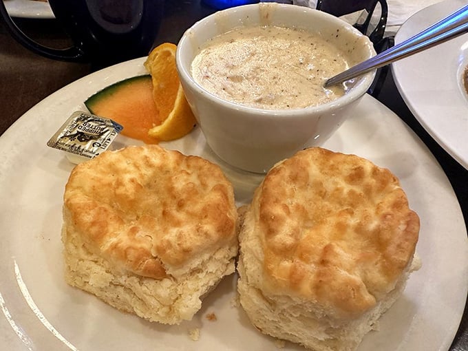 Biscuits that could make a Southern grandmother nod in approval, paired with gravy that's clearly been simmering in someone's family secrets.