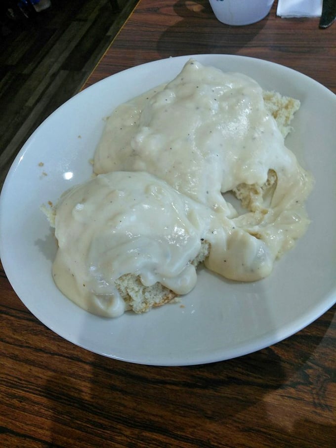 Biscuits swimming in creamy sausage gravy—the breakfast equivalent of a warm hug from your favorite grandma on a chilly morning.