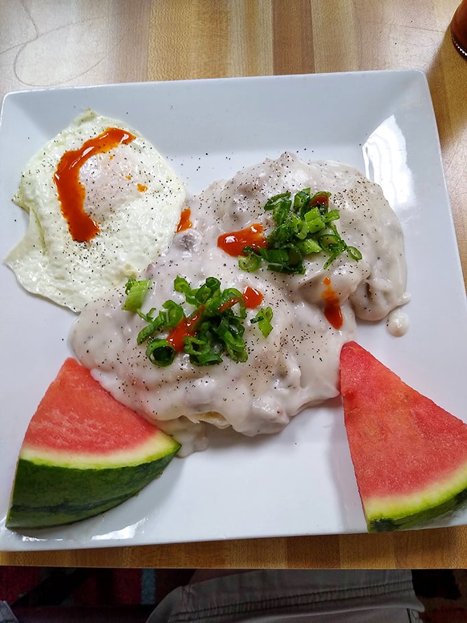 Biscuits and gravy – the breakfast equivalent of a warm hug. Caesar's version makes you question every other biscuit you've ever eaten.