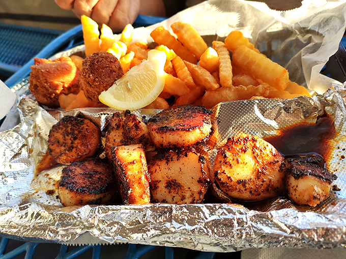 Blackened scallops that would make Neptune himself weep with joy. The char marks are like flavor autographs from the sea gods.