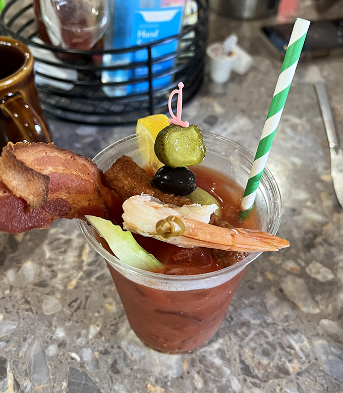 This isn't just a Bloody Mary – it's a portable brunch with enough garnishes to count as its own food group. Breakfast of champions? Absolutely.