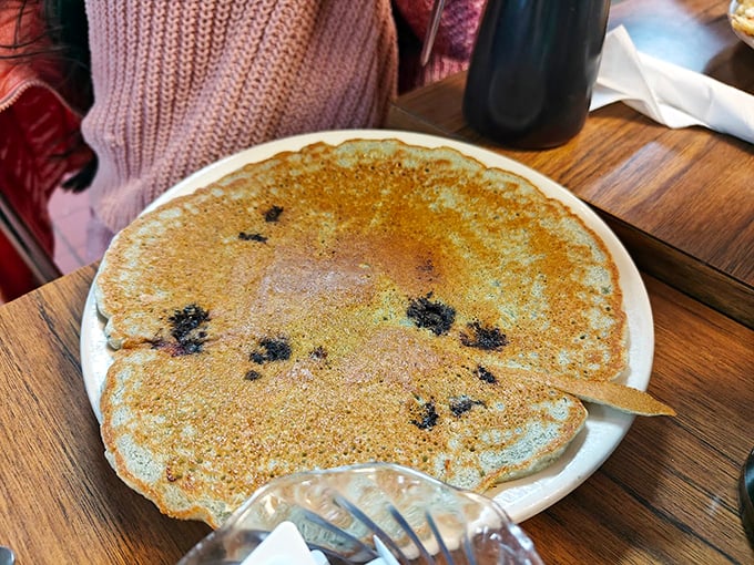 These blueberry pancakes aren't just breakfast—they're edible sunshine with crispy edges and that perfect golden hue that says "good morning" better than words.