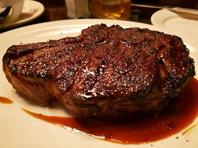This bone-in ribeye isn't just dinner; it's a primal experience with a crust that crackles like a love letter to carnivores everywhere.