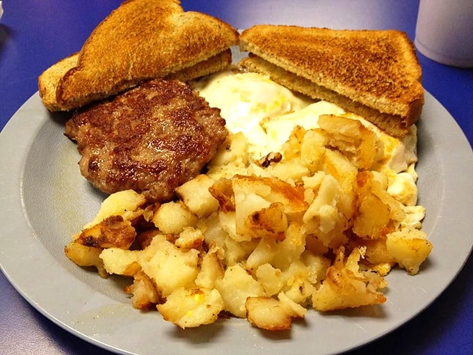 Breakfast at Sunshine isn't Instagram-pretty, but that sausage patty, home fries, and toast combo delivers the comfort your soul actually craves.