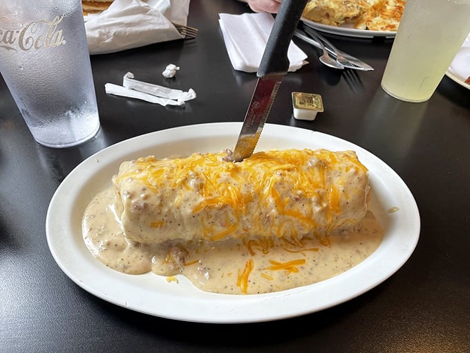 This breakfast burrito isn't messing around—smothered in country gravy and melted cheese, it's the morning equivalent of a warm hug.