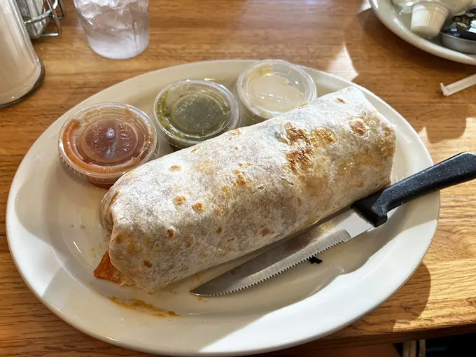 The breakfast burrito at S&G isn't trying to reinvent the wheel—it's just perfecting it. Three sauces because one simply wouldn't be enough.