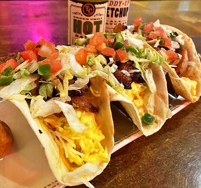 Breakfast tacos that Elvis would approve of—scrambled eggs, pork belly, and fresh pico de gallo nestled in soft shells, ready for their morning encore.