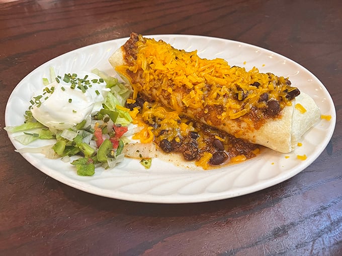 This breakfast burrito isn't just a meal—it's an architectural achievement, layered with beans, cheese, and spices that would make your morning commute worthwhile.