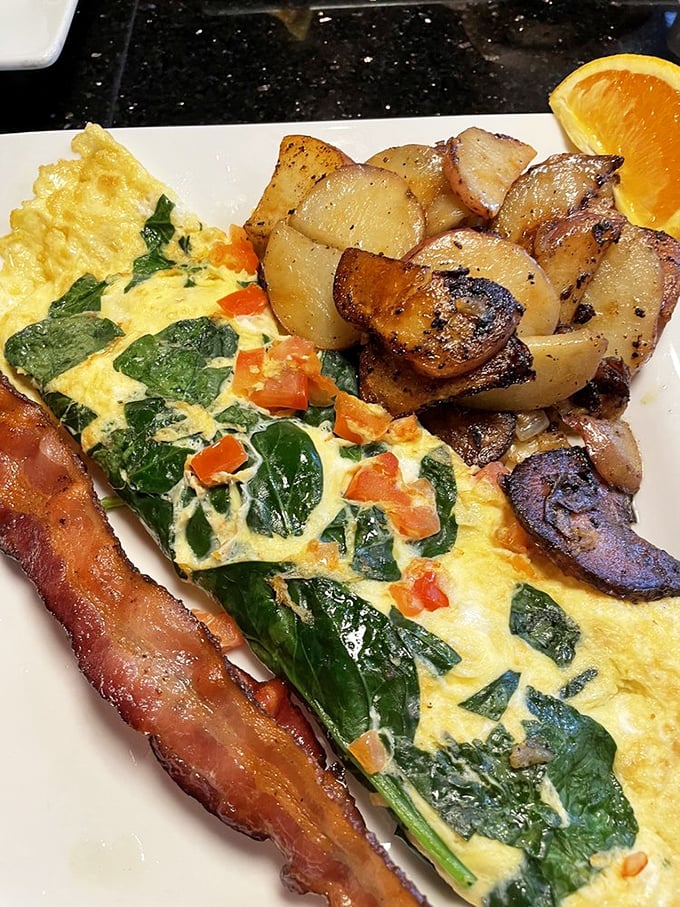 This veggie omelet and home fries combo is the breakfast equivalent of hitting all green lights on your morning commute—everything going right.