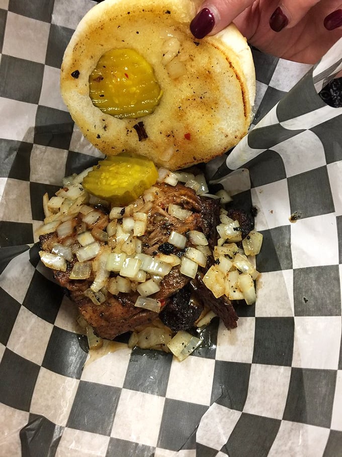 Brisket so tender it practically surrenders at the sight of a fork, paired with pickles that provide the perfect tangy counterpoint.