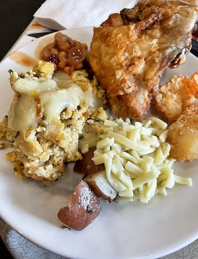 The broasted chicken platter arrives like a family reunion of comfort foods—crispy chicken, homestyle sides, and not a single calorie counter in sight. 