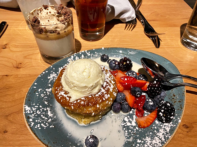 This brown butter cake with fresh berries and ice cream isn't just dessert – it's what other desserts dream about becoming when they grow up.
