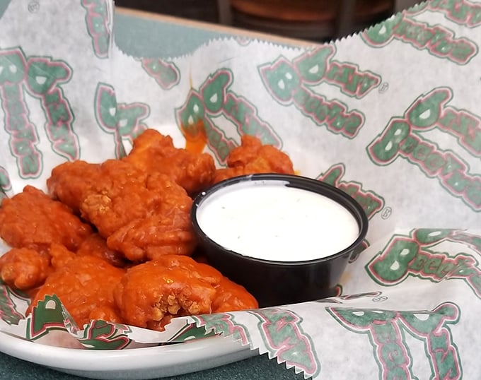 Buffalo wings that don't mess around – crispy, saucy, and served with that cooling ranch dip that makes you brave enough for "just one more."