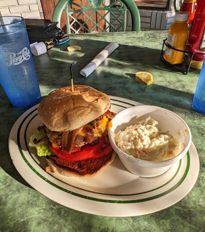 This isn't just a burger—it's an architectural achievement of beef, cheese, and toppings that somehow maintains its structural integrity until the last delicious bite.