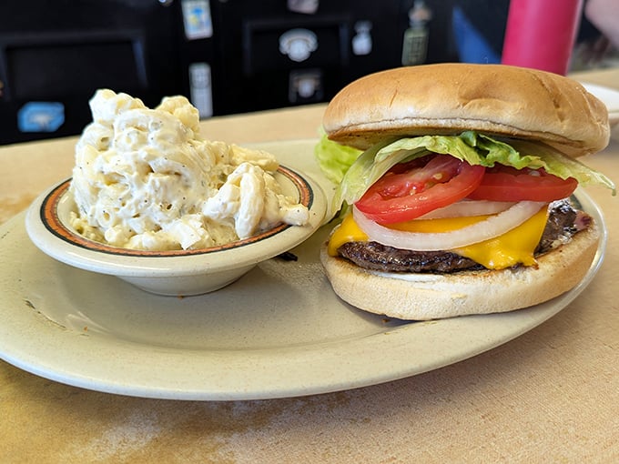 The classic burger and potato salad combo – proof that simplicity, when executed perfectly, beats fancy food trends every single time.