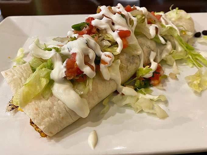 This isn't just any burrito – it's a masterpiece wrapped in white, dressed in green, and ready for its close-up.