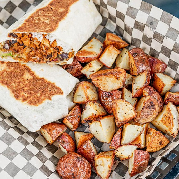 The burrito and roasted potatoes combo isn't just a meal—it's edible architecture, with layers of flavor carefully constructed to make you forget you're eating virtuously. 