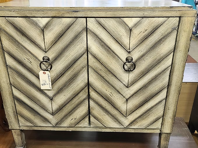 This herringbone cabinet isn't just furniture—it's architectural poetry. Mid-century charm without the mid-century markup!