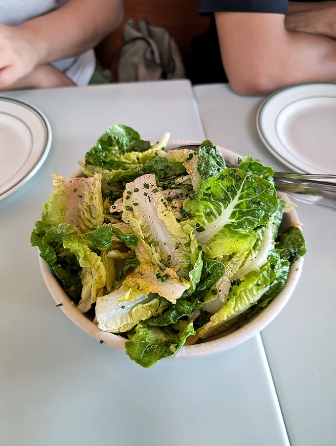 Even the humble Caesar salad gets the Quarter Sheets treatment—crisp, perfectly dressed, and making you wonder why other salads try so hard.