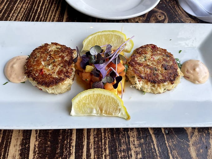 These crab cakes don't just sit on the plate—they perform, with minimal filler and maximum flavor. The perfect marriage of crispy exterior and sweet, tender crab.