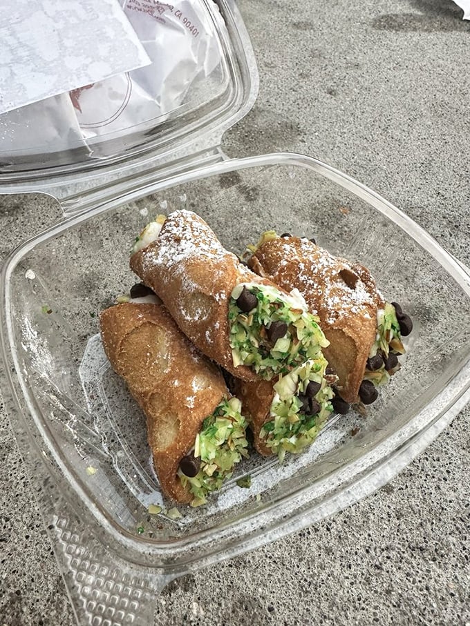 These cannoli don't play by the rules—crispy shells, creamy filling, and chocolate chips create a dessert worth breaking any diet for.