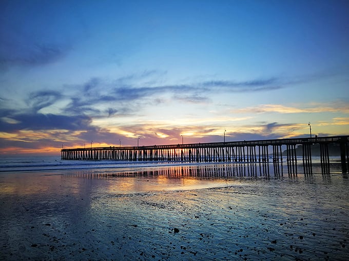 Sunset transforms the Cayucos Pier into a silhouette masterpiece, proving that the best light show in California doesn't require electricity.