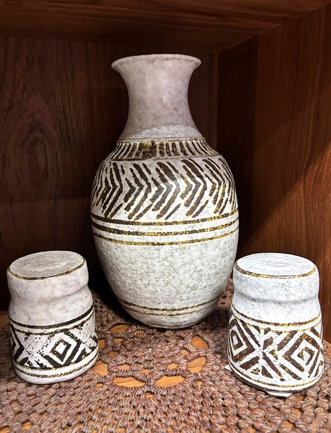 These geometric-patterned vessels aren't just ceramics—they're time capsules of artisanship that modern 3D printers can only dream of replicating.