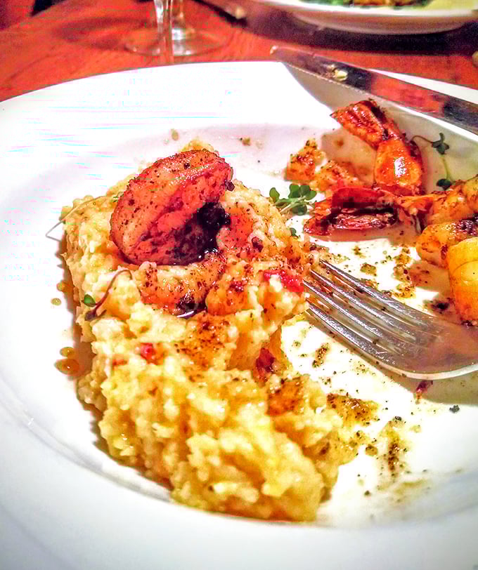 Seafood and cheese grits—a Southern classic elevated. Those seared scallops perched atop creamy risotto are the culinary equivalent of finding money in an old jacket pocket.