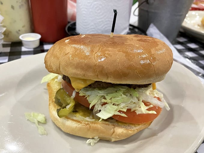A burger that doesn't need fancy toppings to impress—just honest ingredients stacked with care. Simple perfection on a toasted bun.