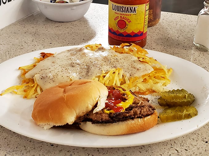 The perfect Kansas City plate—a burger with all the fixings alongside hash browns that somehow manage to be both crispy and tender in perfect harmony.