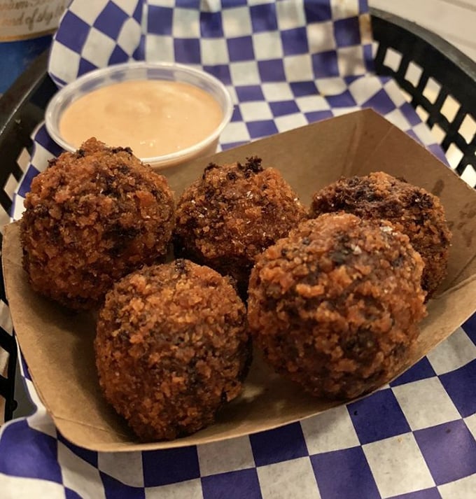 These golden-brown spheres of joy aren't just chicken poppers—they're edible proof that perfection comes in small packages.