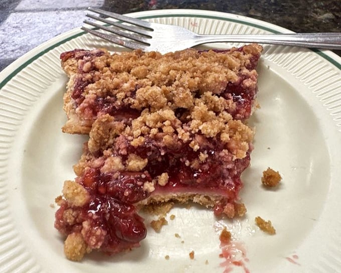 Cherry pie with that perfect crumble topping—where the fruit still has some tartness to balance the sweet, like a culinary yin-yang of dessert perfection.
