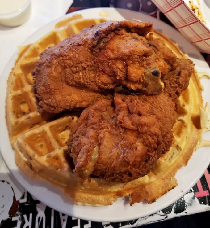 Southern meets Irish in this unexpected twist—crispy fried chicken atop golden waffles, proving cultural fusion can be deliciously rebellious.