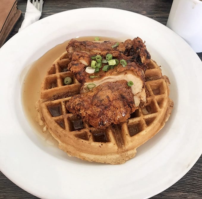 Chicken and waffles – the food equivalent of a perfect marriage. Crispy, savory chicken perched atop golden waffles with a drizzle of syrup that ties the whole relationship together.