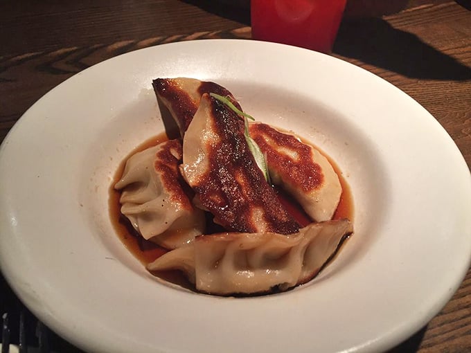 These dumplings aren't just cooked, they're caramelized to perfection—like the culinary equivalent of hitting every green light on your commute home.