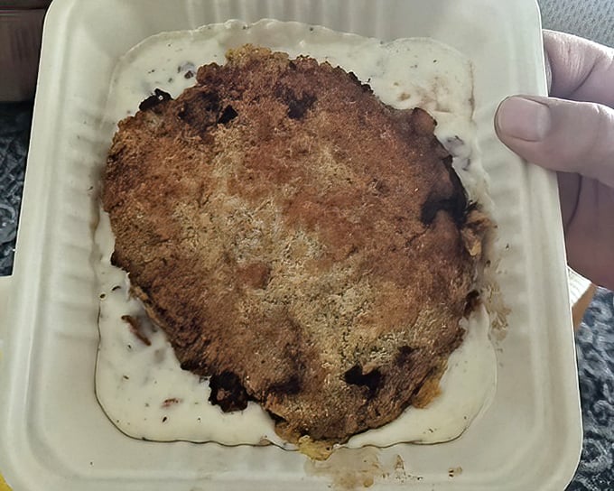 Chicken fried steak that's achieved the impossible—crispy exterior, tender interior, and gravy that should be classified as a controlled substance.