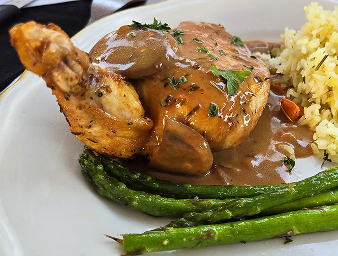 Chicken marsala that doesn't just swim in sauce but practically performs synchronized swimming in it—pure comfort on a plate.