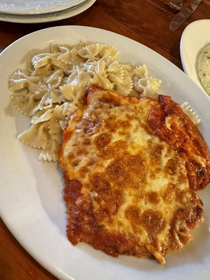 Classic chicken parmigiano meets perfectly cooked farfalle pasta—a combination that makes you want to stand up and applaud.