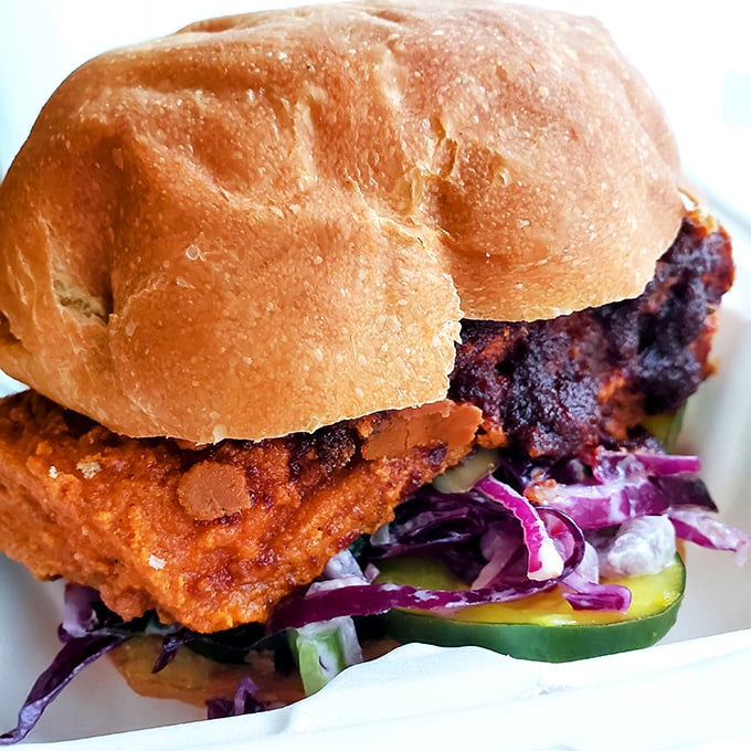 This isn't just a sandwich—it's edible art. The vibrant colors and textures make this creation as beautiful as it is delicious.