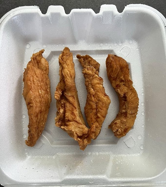 Chicken tenders that actually taste like chicken—what a concept! Crispy armor protecting juicy treasure within, no dipping sauce required but highly recommended.