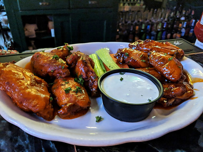 These aren't just wings; they're a masterclass in sauce application – glistening, sticky-sweet with a hint of heat, and impossibly tempting.
