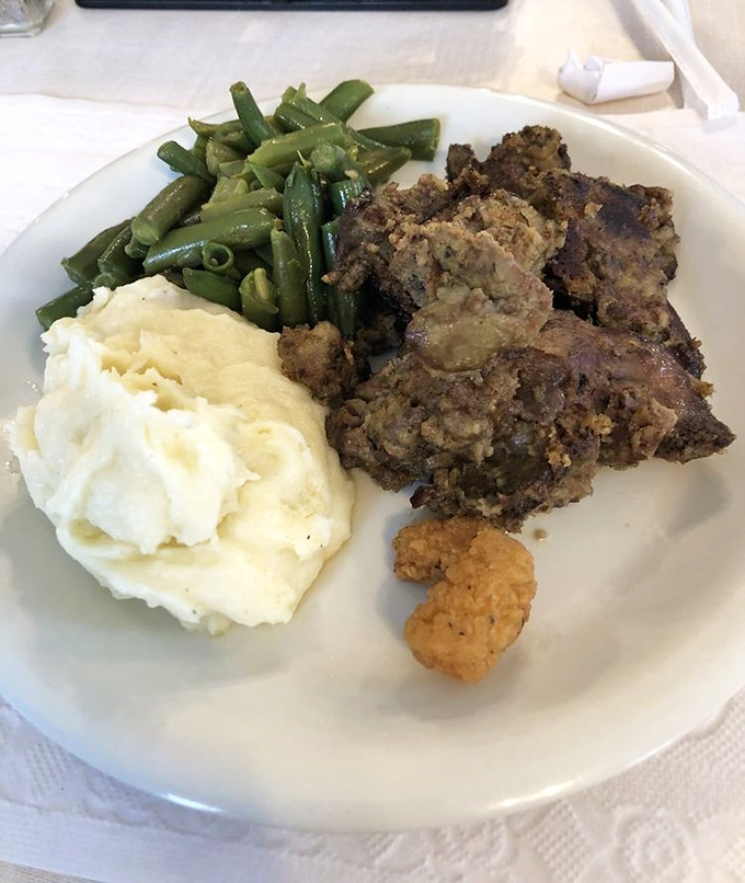 These chicken livers might convert even the most offal-averse diners—paired with those cloud-like mashed potatoes and green beans.