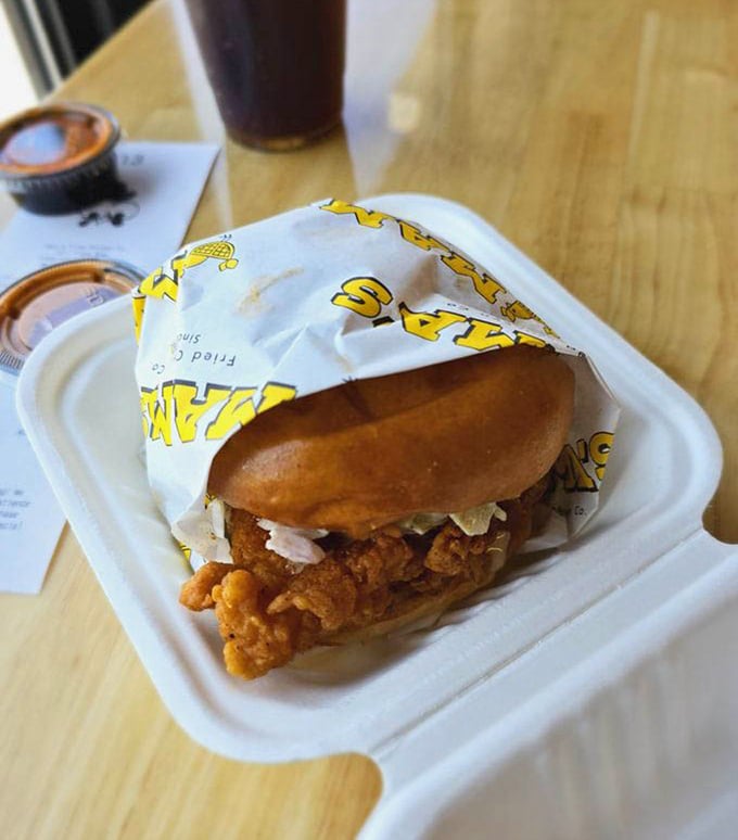 This isn't just a sandwich; it's architecture—a perfectly balanced structure of crispy chicken, soft bun, and just enough sauce.