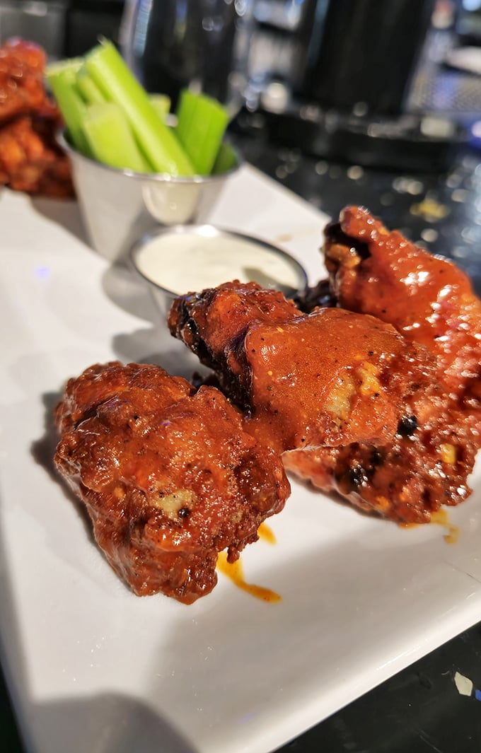 These wings aren't just crispy, they're the kind that make you involuntarily close your eyes on first bite – meditation through chicken.